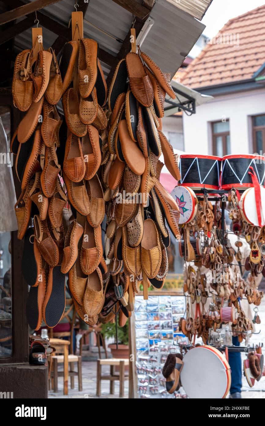 Collection of lots of traditional handmade colorful shoes in the bazaar ...