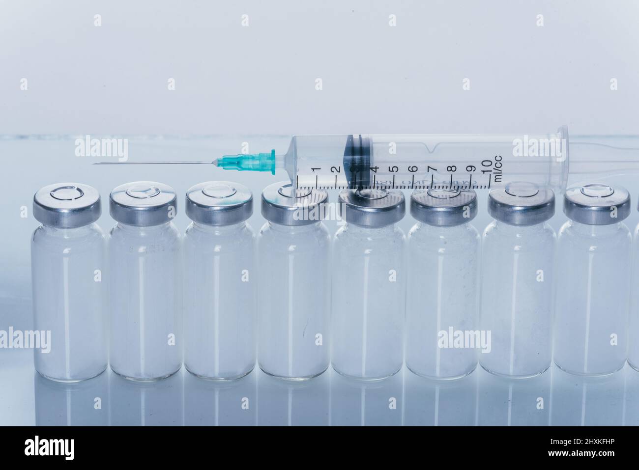 Medicine, Injection, vaccine and disposable syringe, drug concept ...