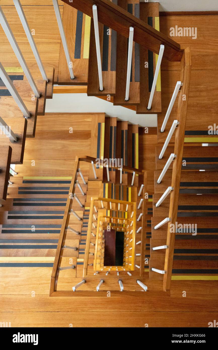 Wood and metal staircase inside Ashdown House, Hastings. Former DWP ...