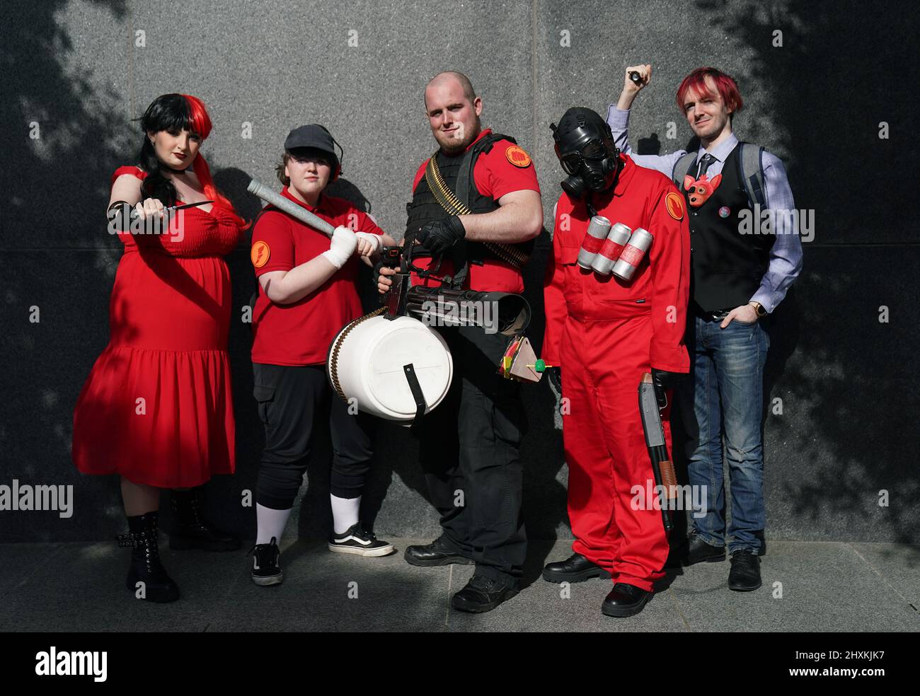 Cosplayers (from left) Kai Byrne as 'Harlequin', Elliott Harford as ...