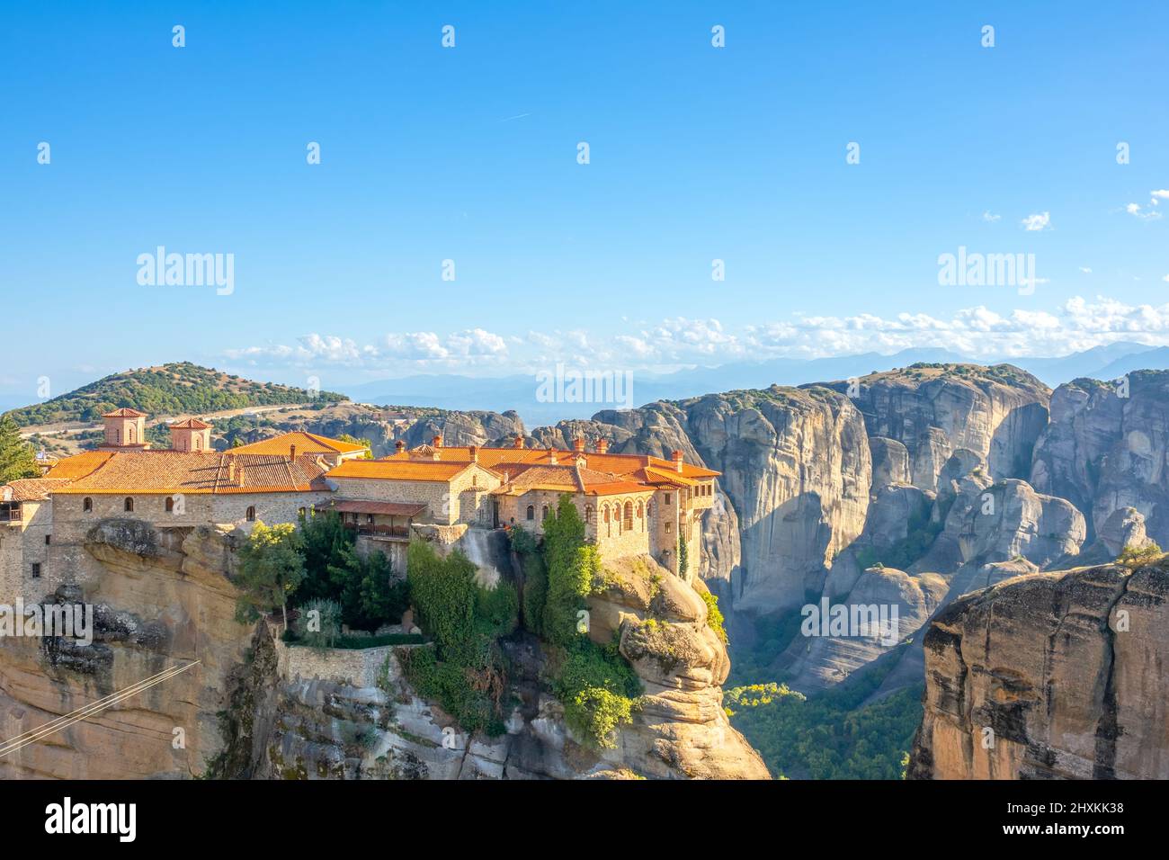Greece. Clear summer day in Meteora. Several buildings of a rock ...