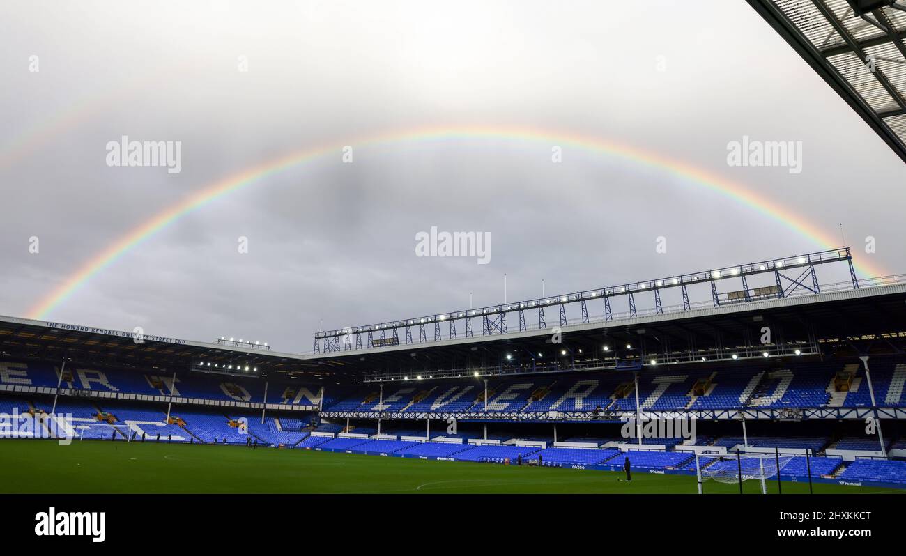 Liverpool, England, 13th March 2022. A rainbow appears over the stadium ...