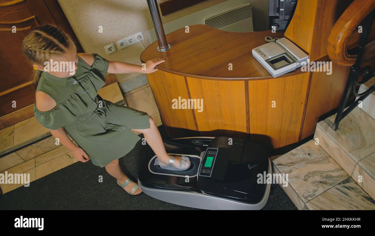 Automatic Thermal Shrinkable Shoe Cover Laminating Machine. Close up ...