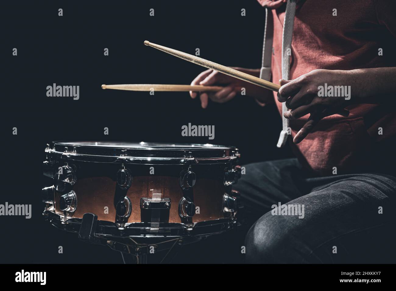 The drummer's hands hold drumsticks and play the snare drum Stock Photo ...