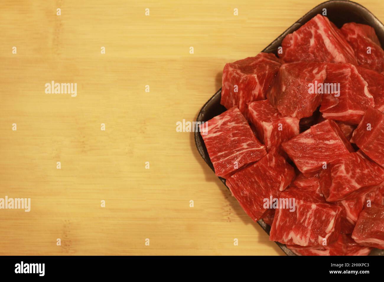 Square size chopped red beef cube Stock Photo - Alamy