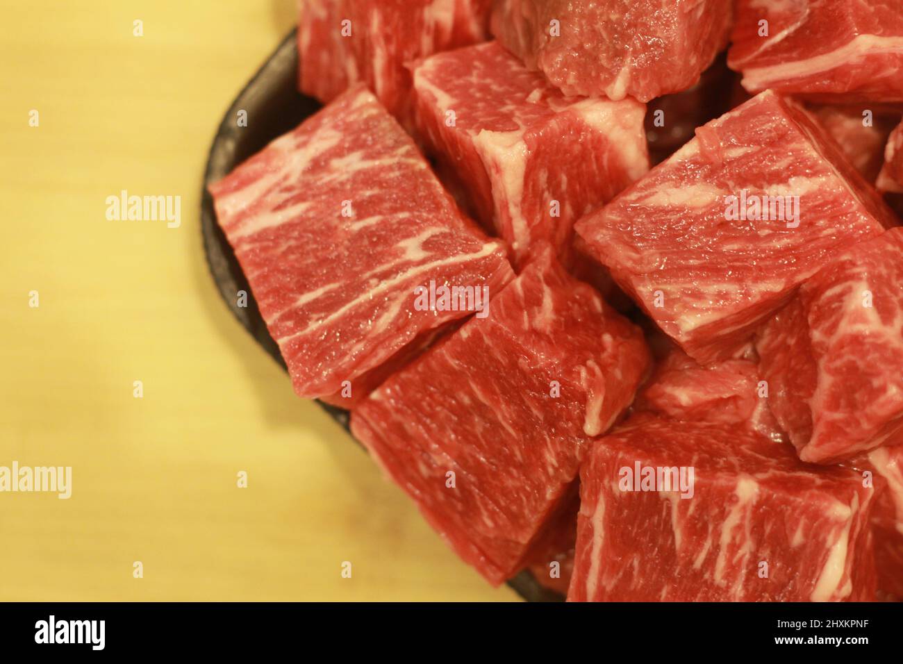 Square size chopped red beef cube Stock Photo - Alamy