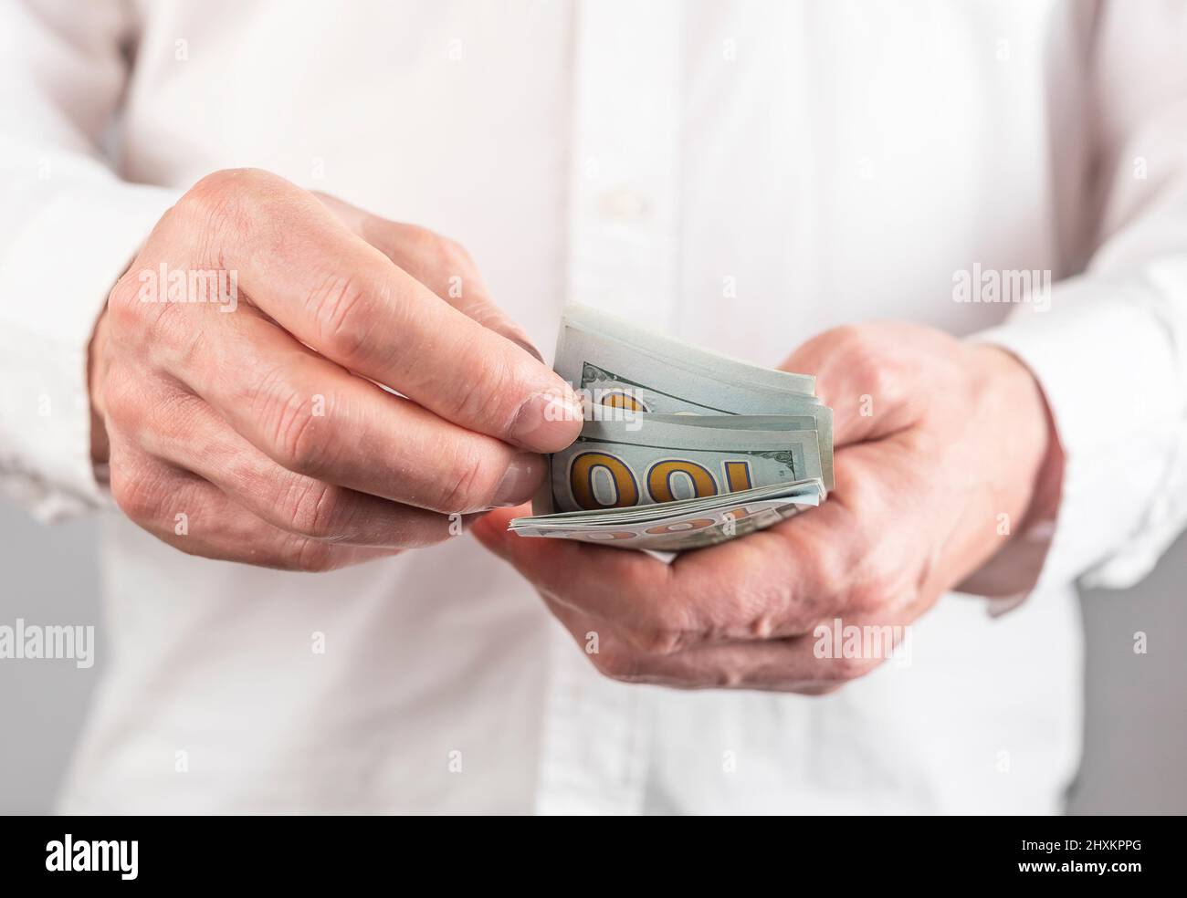 Hands closeup counting 100 US dollar bills, paper currency. Savings ...