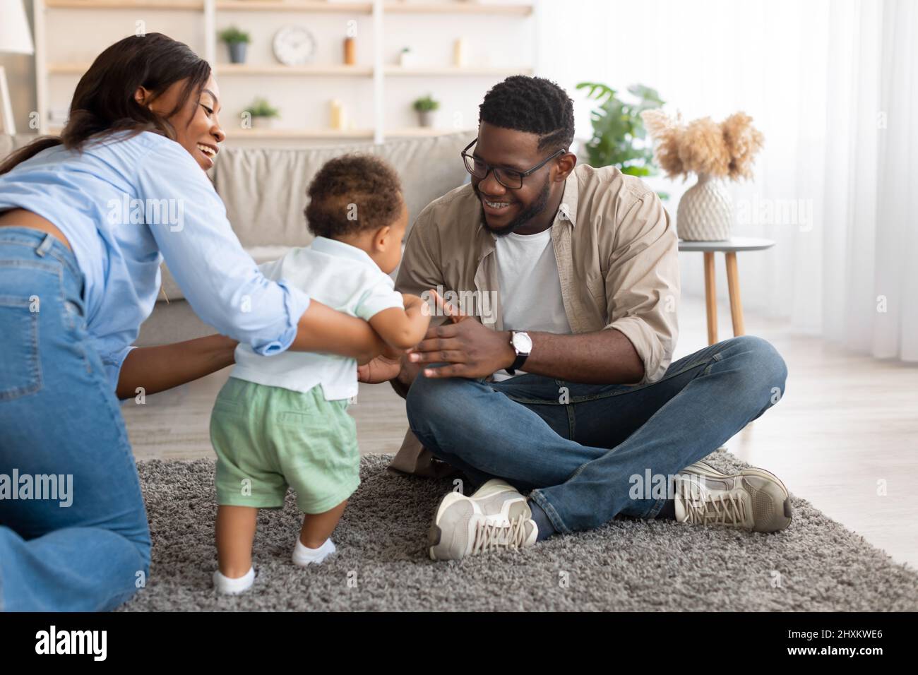 First steps black baby hi-res stock photography and images - Alamy