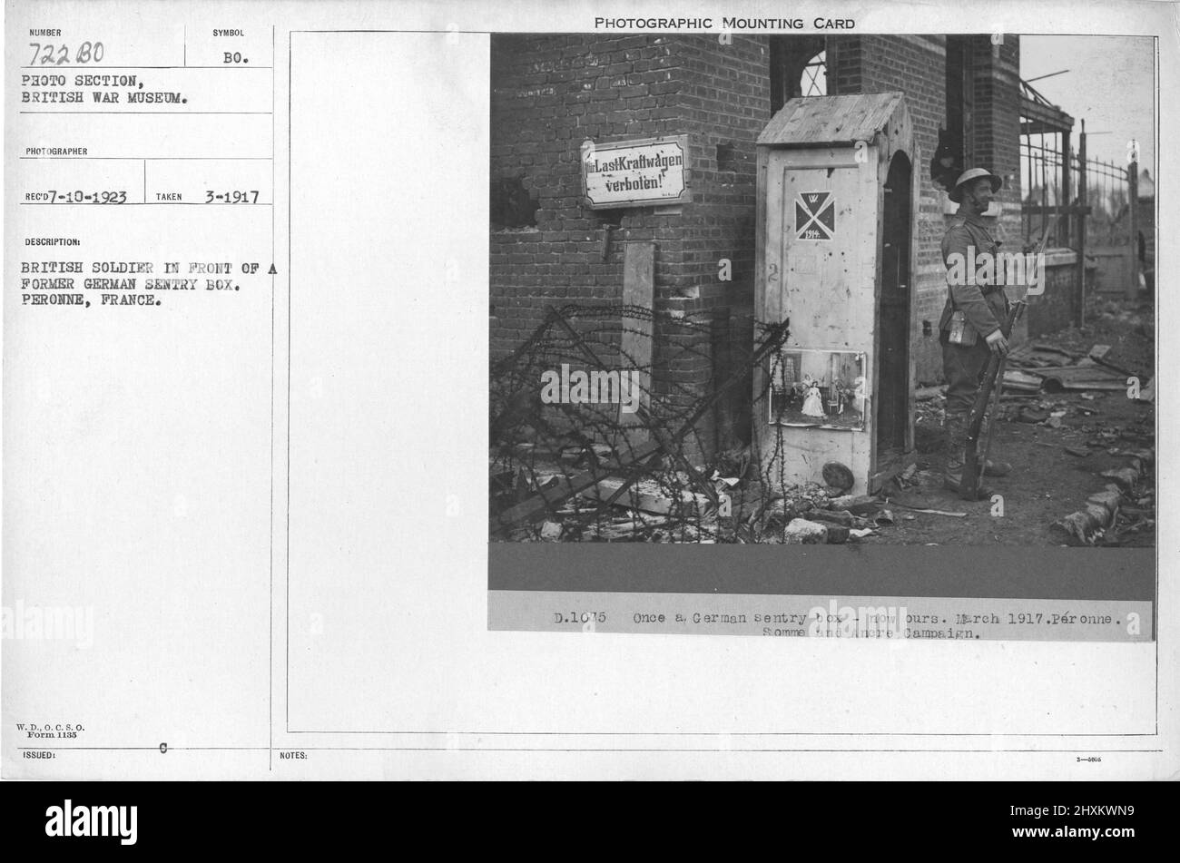 British soldier in front of a former German sentry box. Peronne, France ...