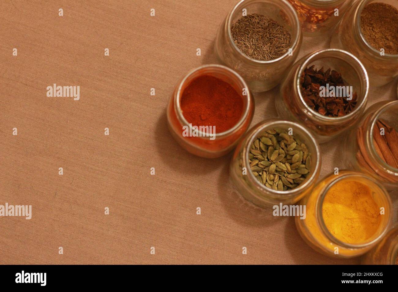 Cooking ingredients masala in glass jars Stock Photo - Alamy