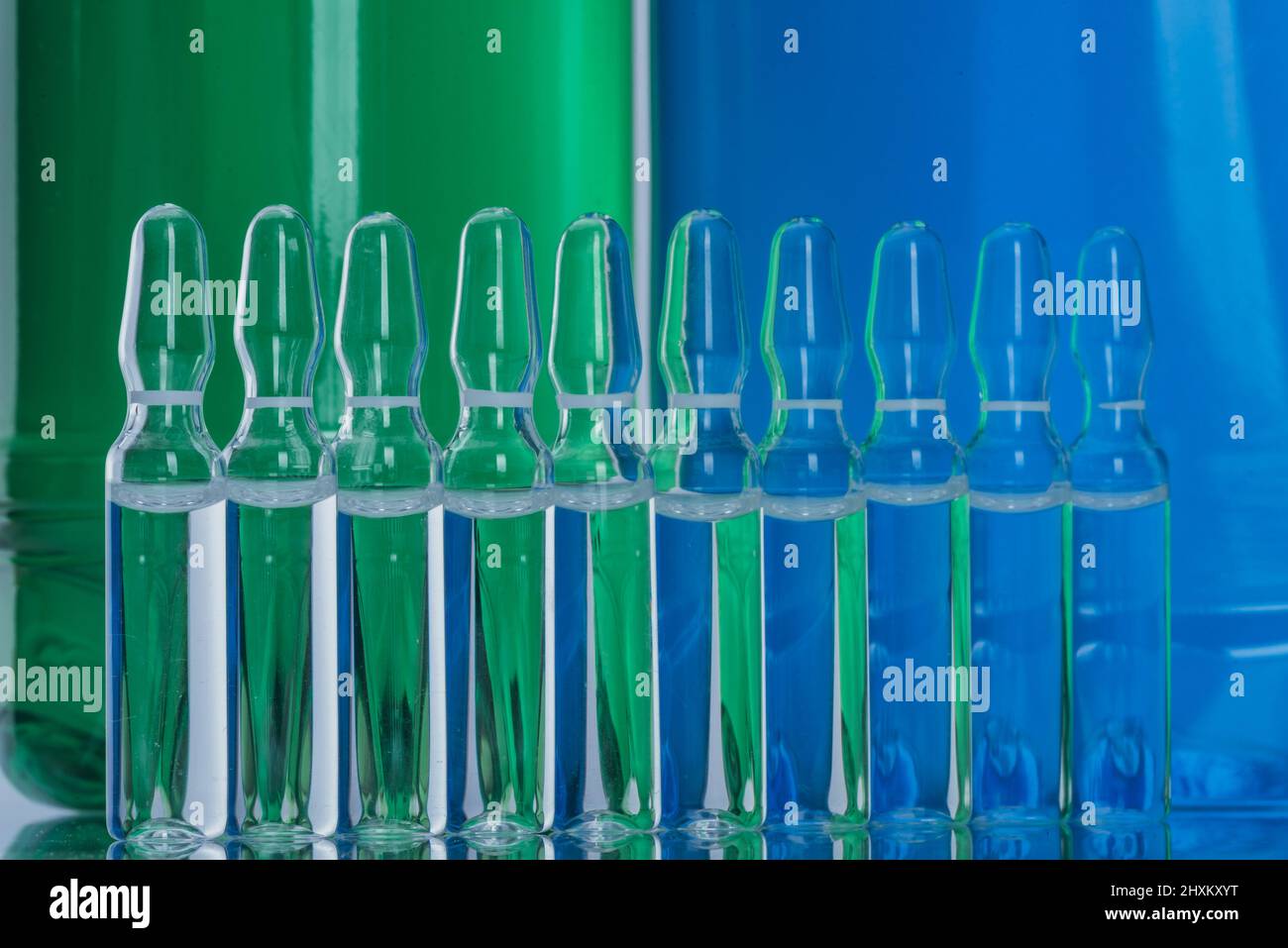 Glass medical ampoule vial for injection. Medicine is liquid sodium ...