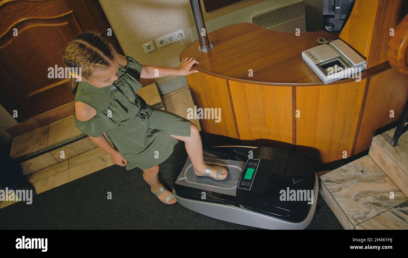 Automatic Thermal Shrinkable Shoe Cover Laminating Machine. Close up ...