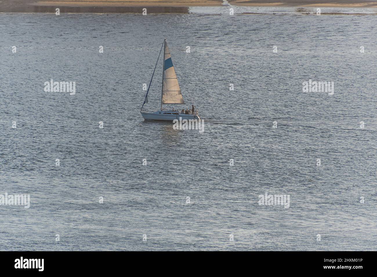 Sailboat sailing in the morning Stock Photo - Alamy