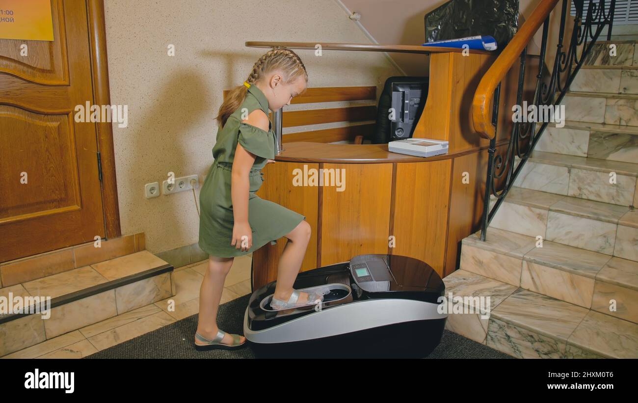 Automatic Thermal Shrinkable Shoe Cover Laminating Machine. Close up ...