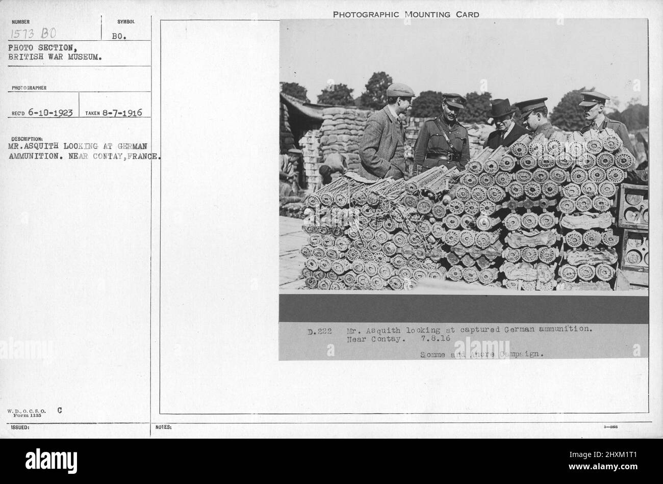 Mr. Asquith looking at German ammunition, near Contay, France. 8-7-1916 ...