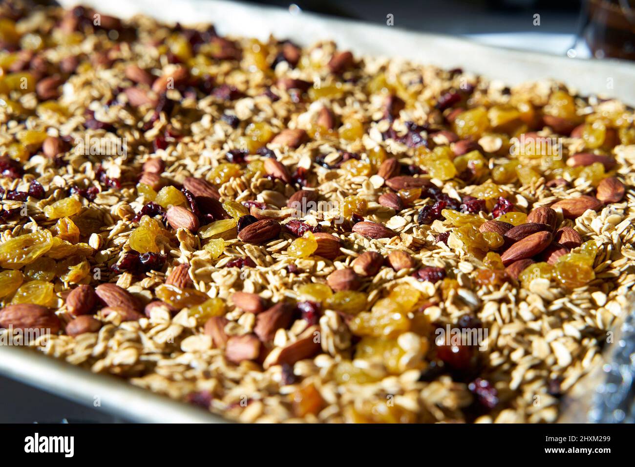 Pan of home made baked granola in kitchen Stock Photo - Alamy