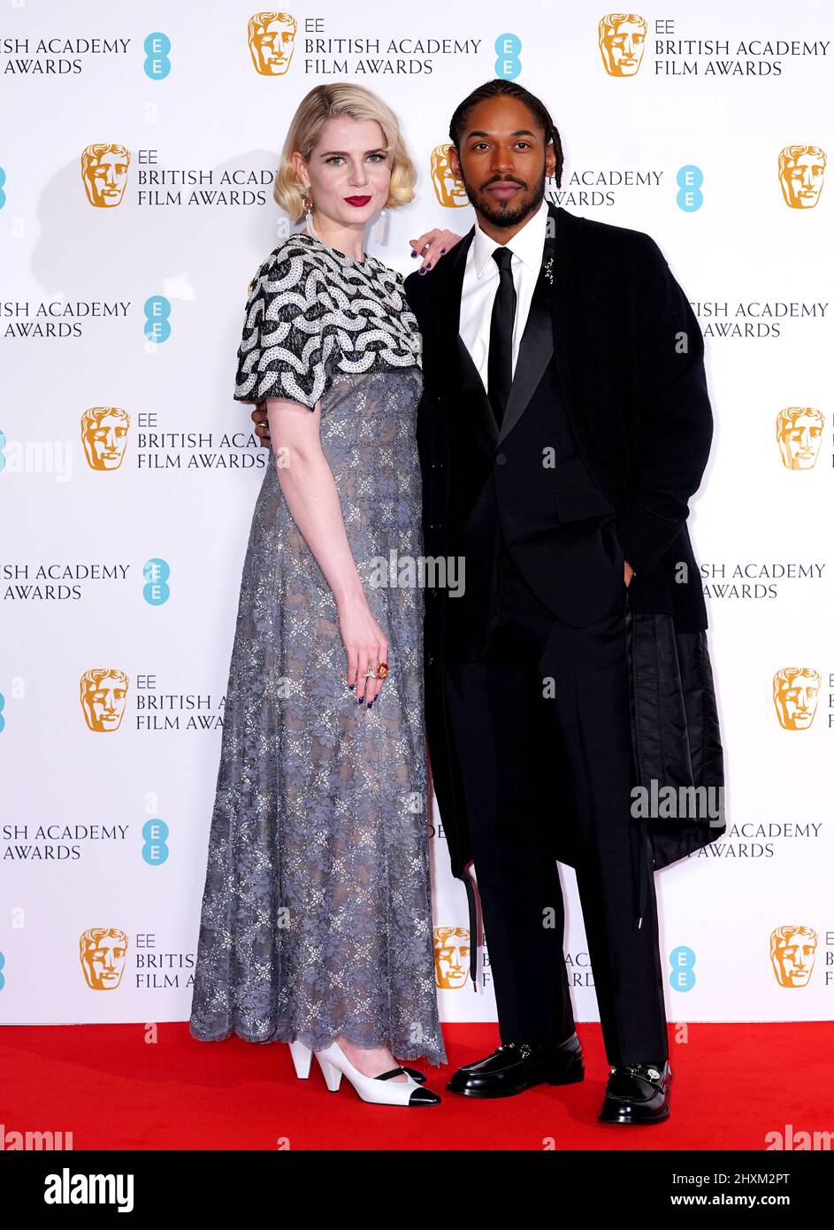 Lucy Boynton and Kelvin Harrison Jr. in the press room at the 75th ...
