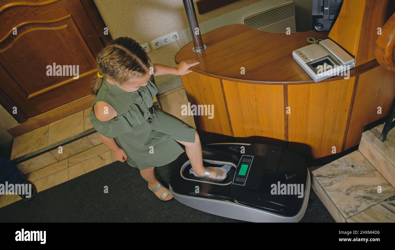 Automatic Thermal Shrinkable Shoe Cover Laminating Machine. Close up ...