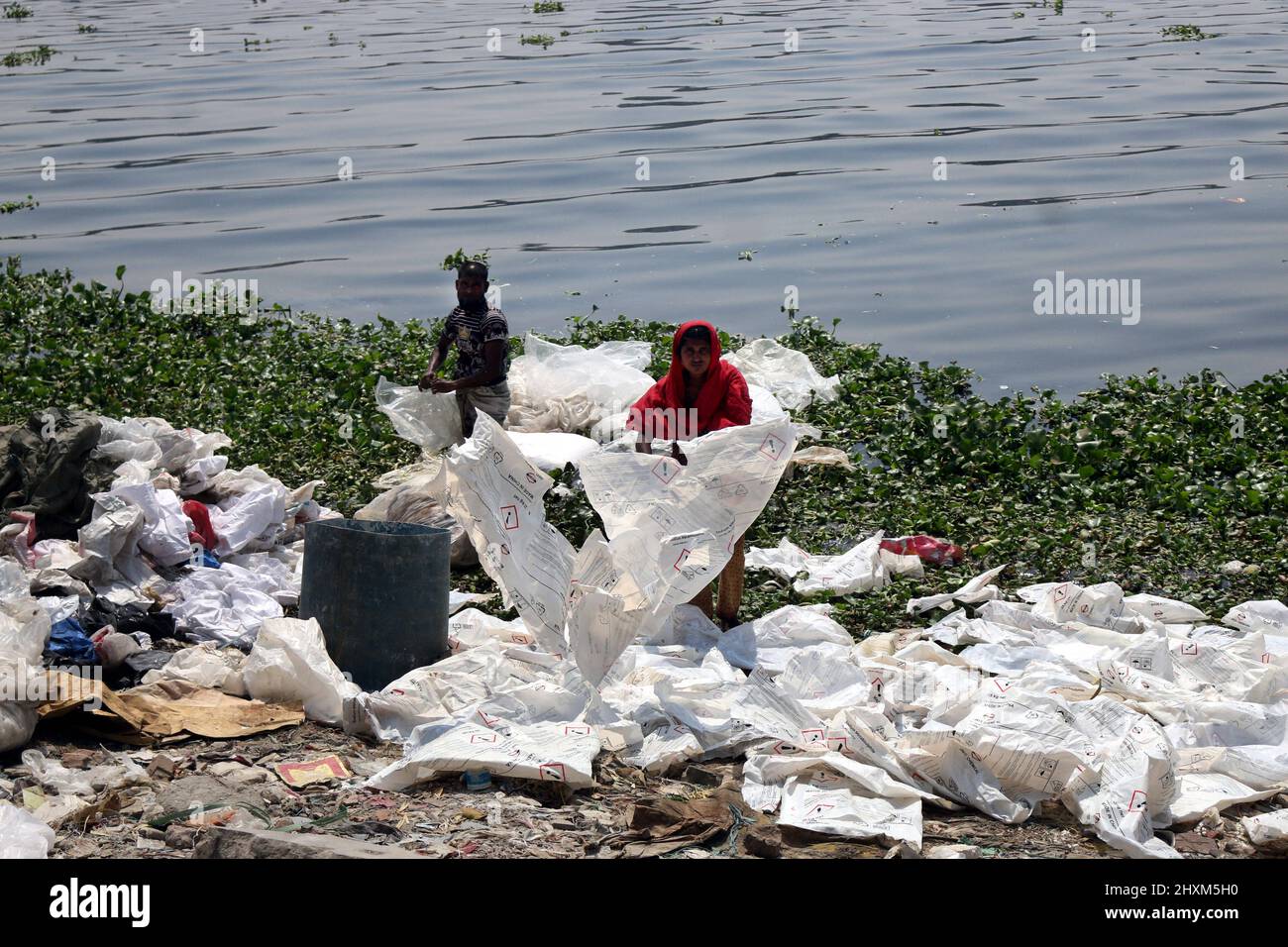 Dhaka, Bangladesh. March 13,2022, Workers collects polythene and ...