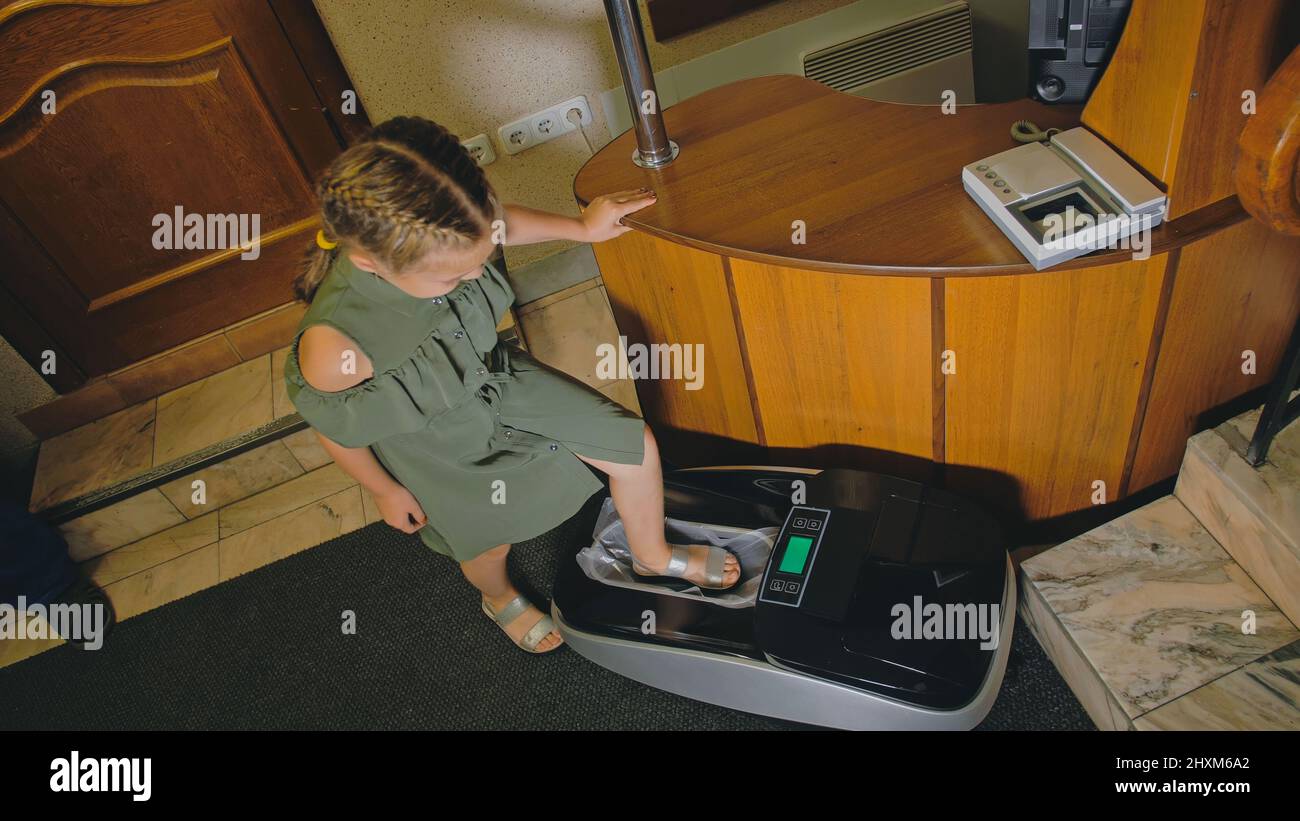 Automatic Thermal Shrinkable Shoe Cover Laminating Machine. Close up ...