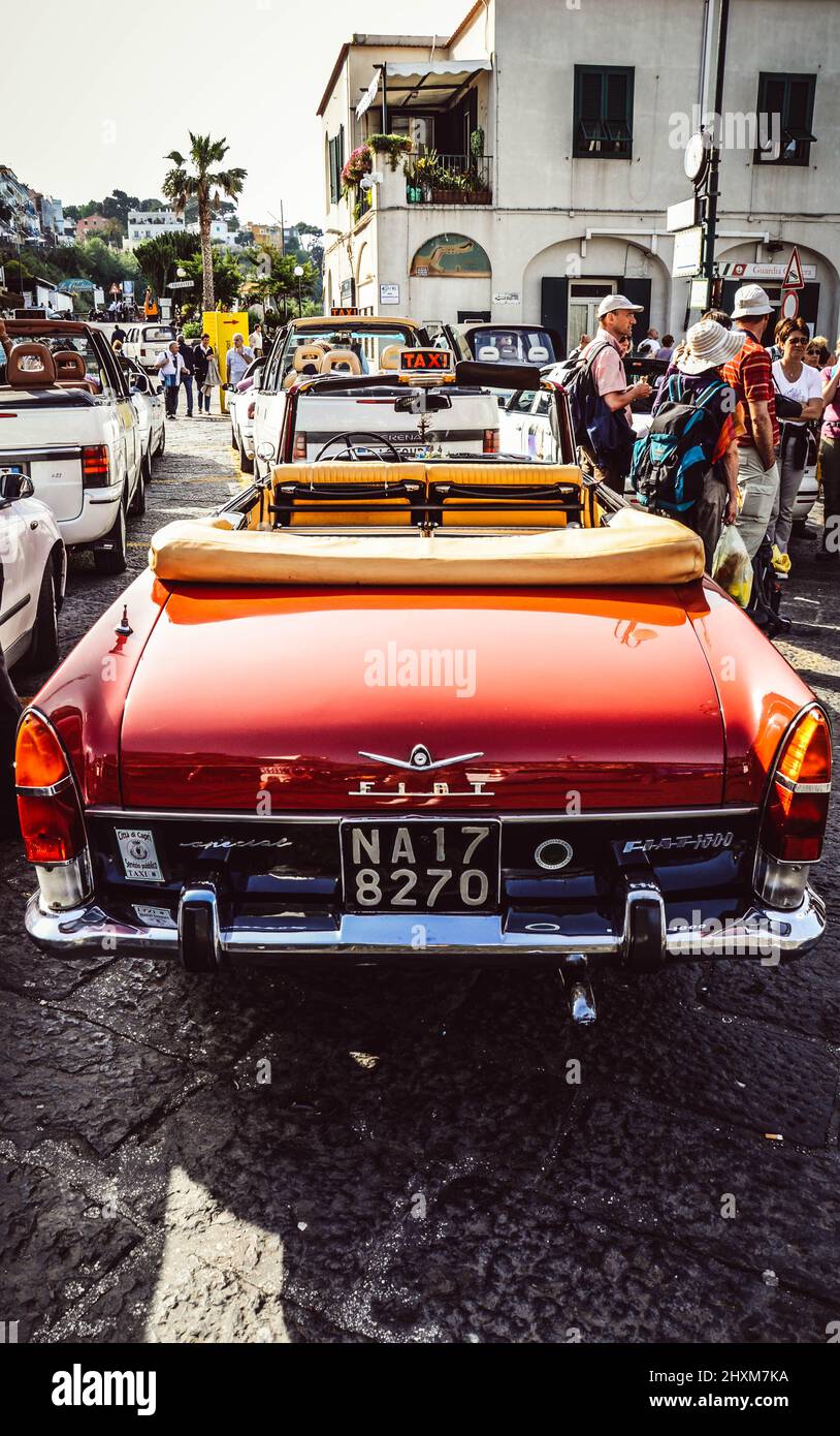 One of the iconic open top red taxis of Capri Stock Photo - Alamy