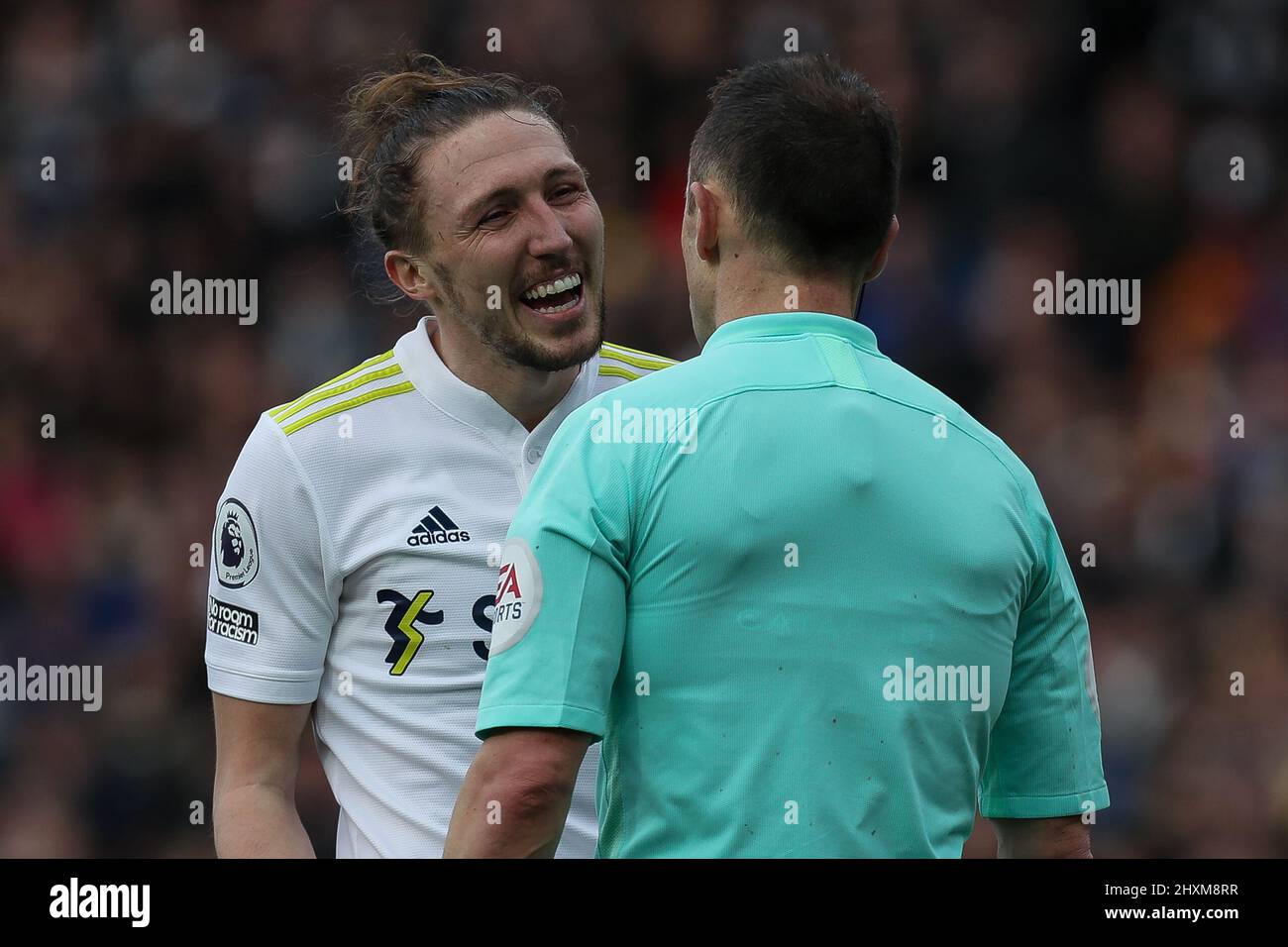 Luke Ayling #2 of Leeds United speaks with Referee Stuart Attwell ...