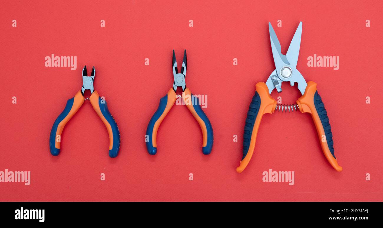 Sheet metal shears with steel point, orange, blue color rubber handle ...