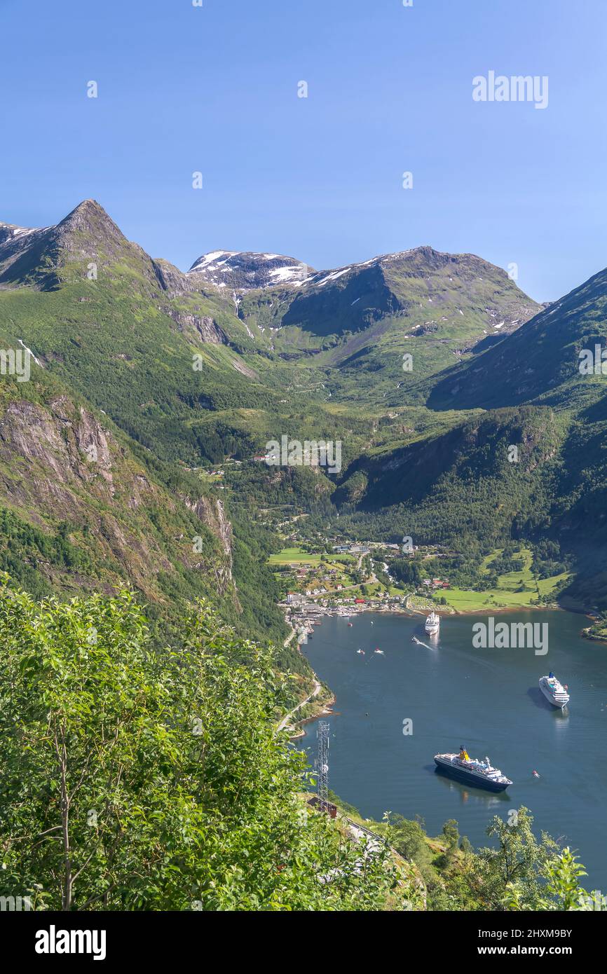 view of Geirangerfjord port with several cruise ships at anchor, from ...
