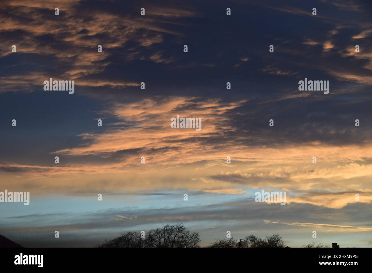 Cloud shapes and colours at sunset Stock Photo - Alamy