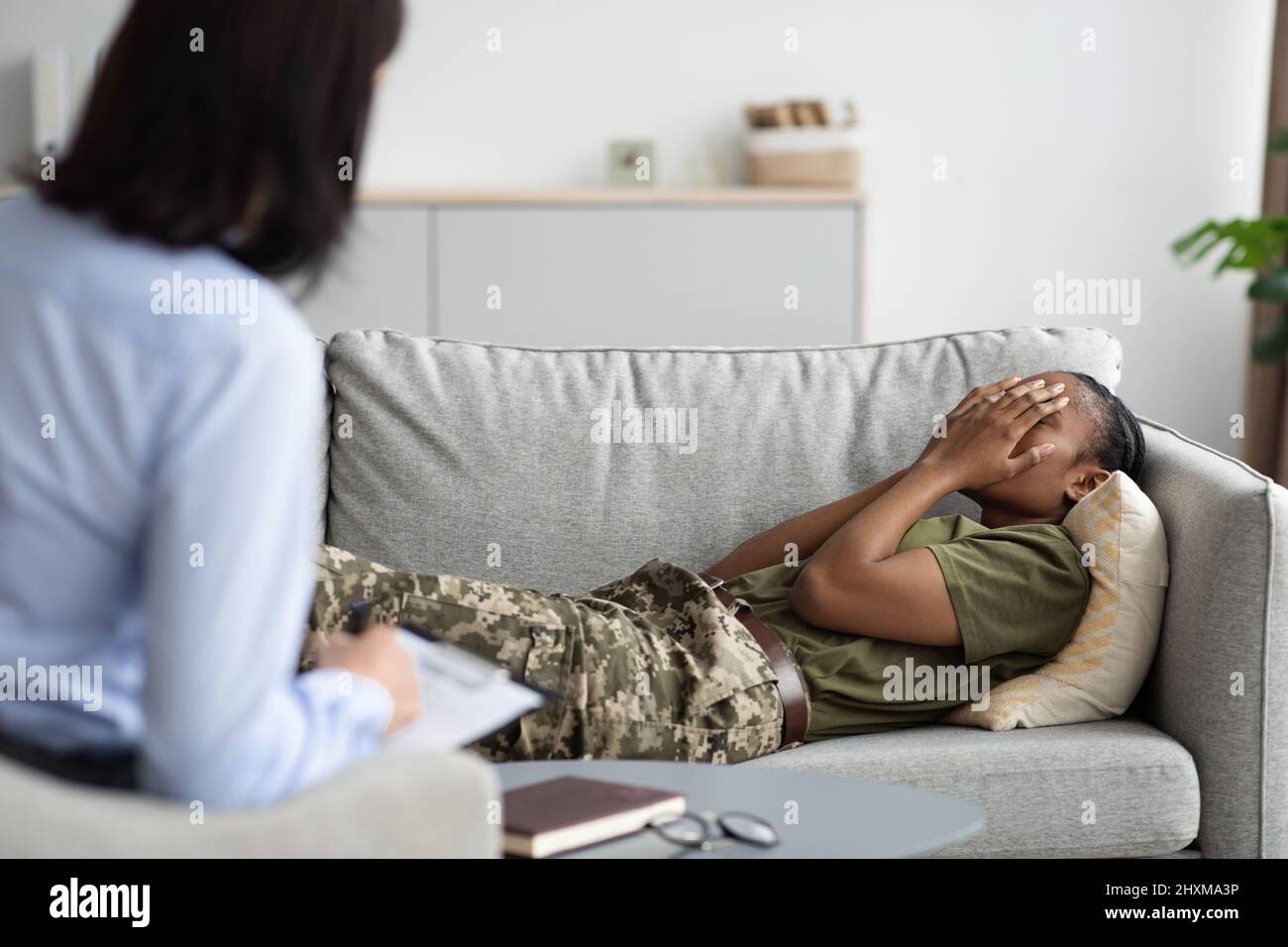 Psychotherapy. Crying Black Female Soldier Lying On Couch During ...