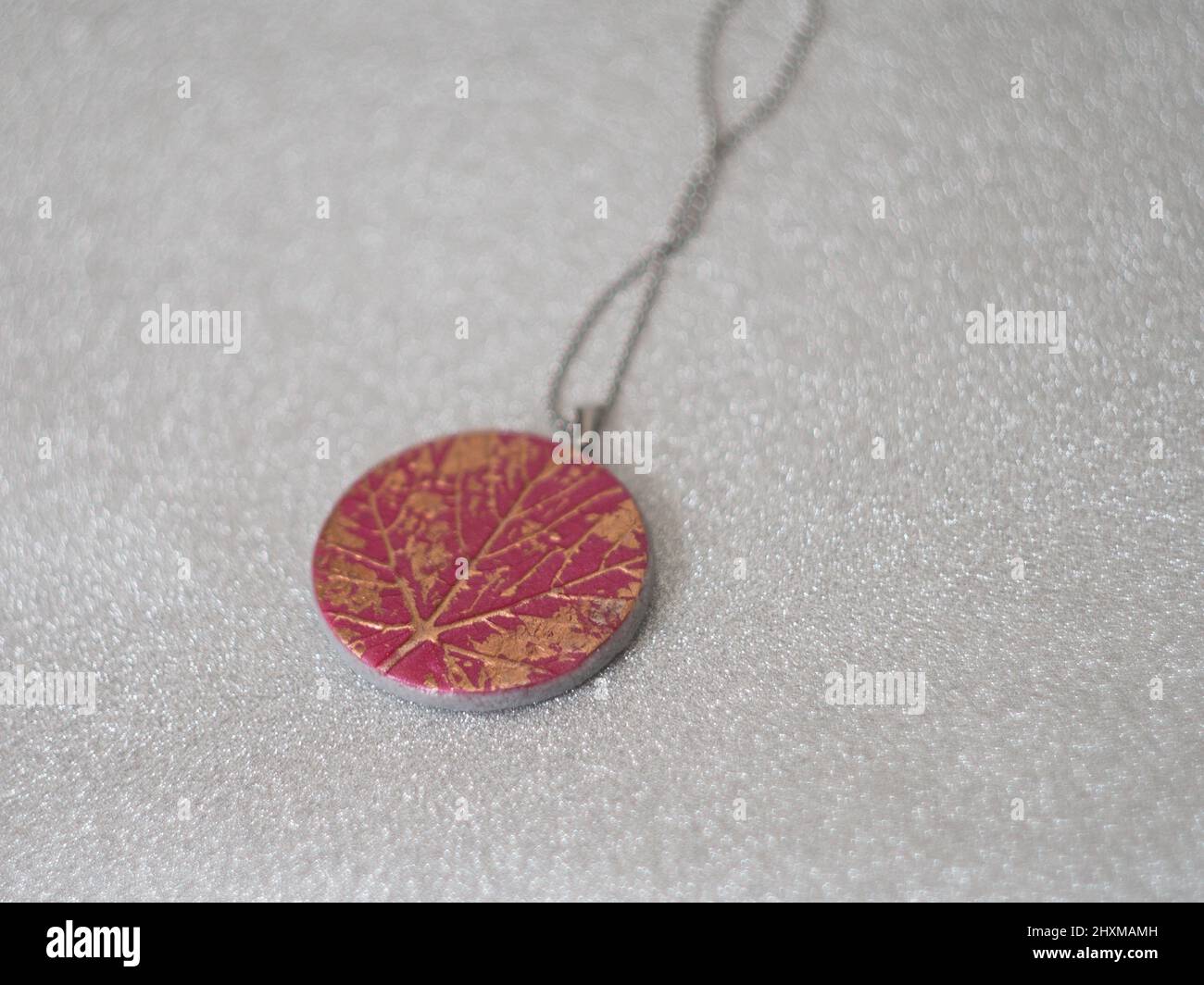 necklace with handmade polymer clay leaf texture pendant Stock Photo ...