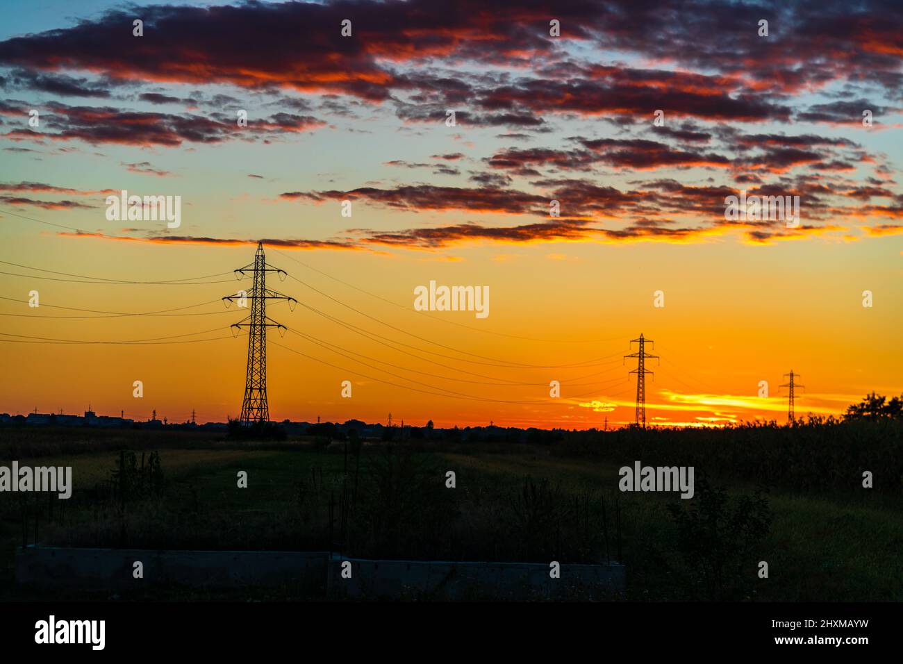 Detail of electric pole with electric cables and crop fields Stock ...