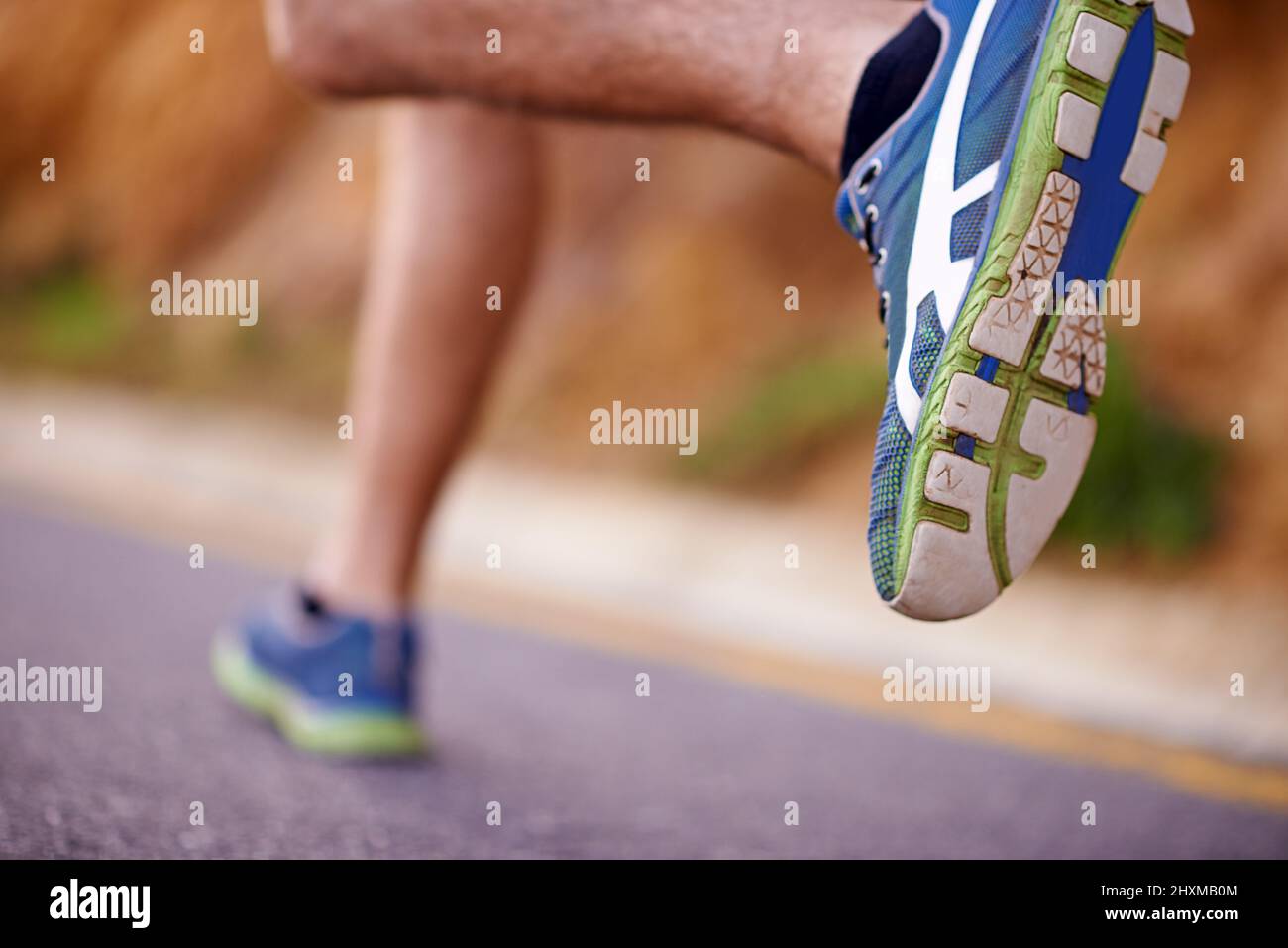 My favorite mode of transport. Low angle shot of a mans legs running ...