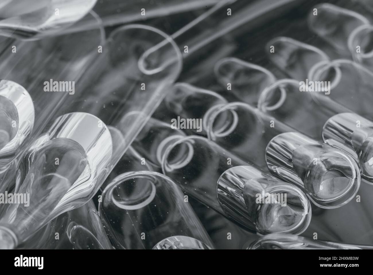 Glass medical ampoule vial for injection. Medicine is liquid sodium ...