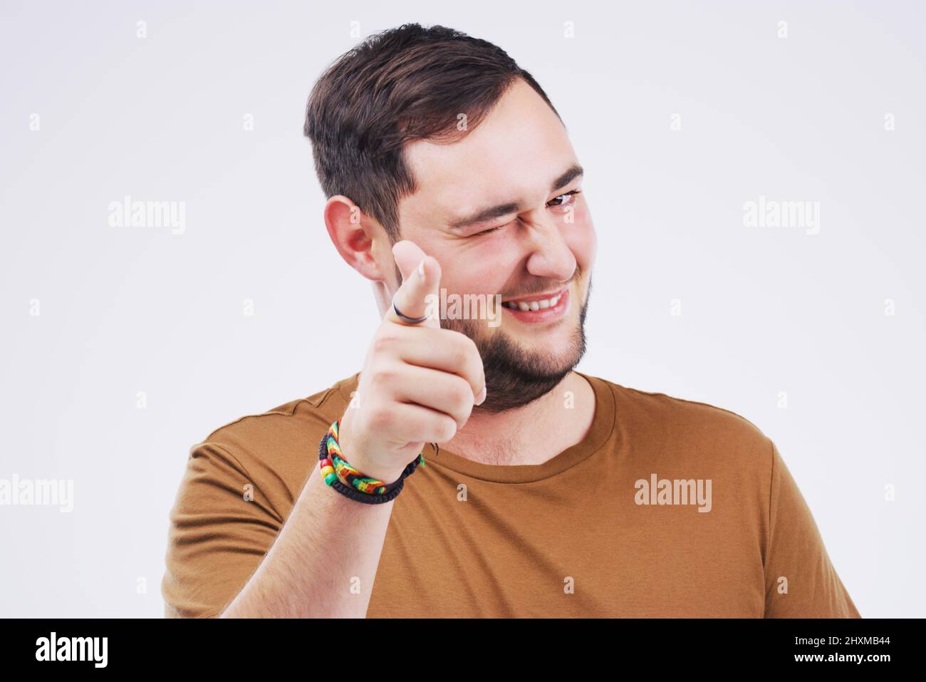 Youre the main man. Portrait of a handsome young man winking and ...