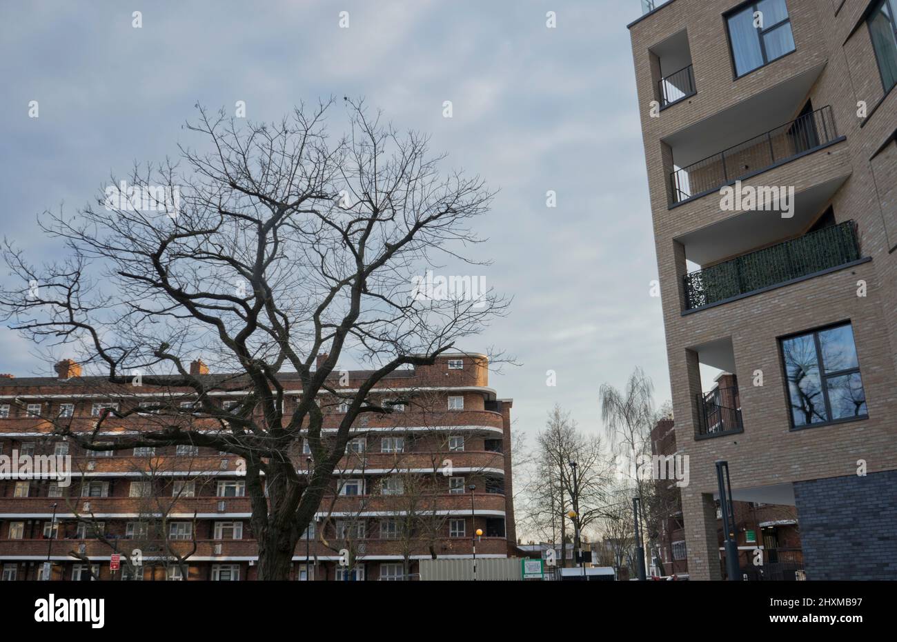 New luxury housing development next to run-down social housing estate ...