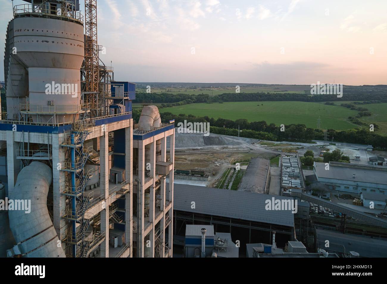 Aerial view of cement factory with high concrete plant structure and ...