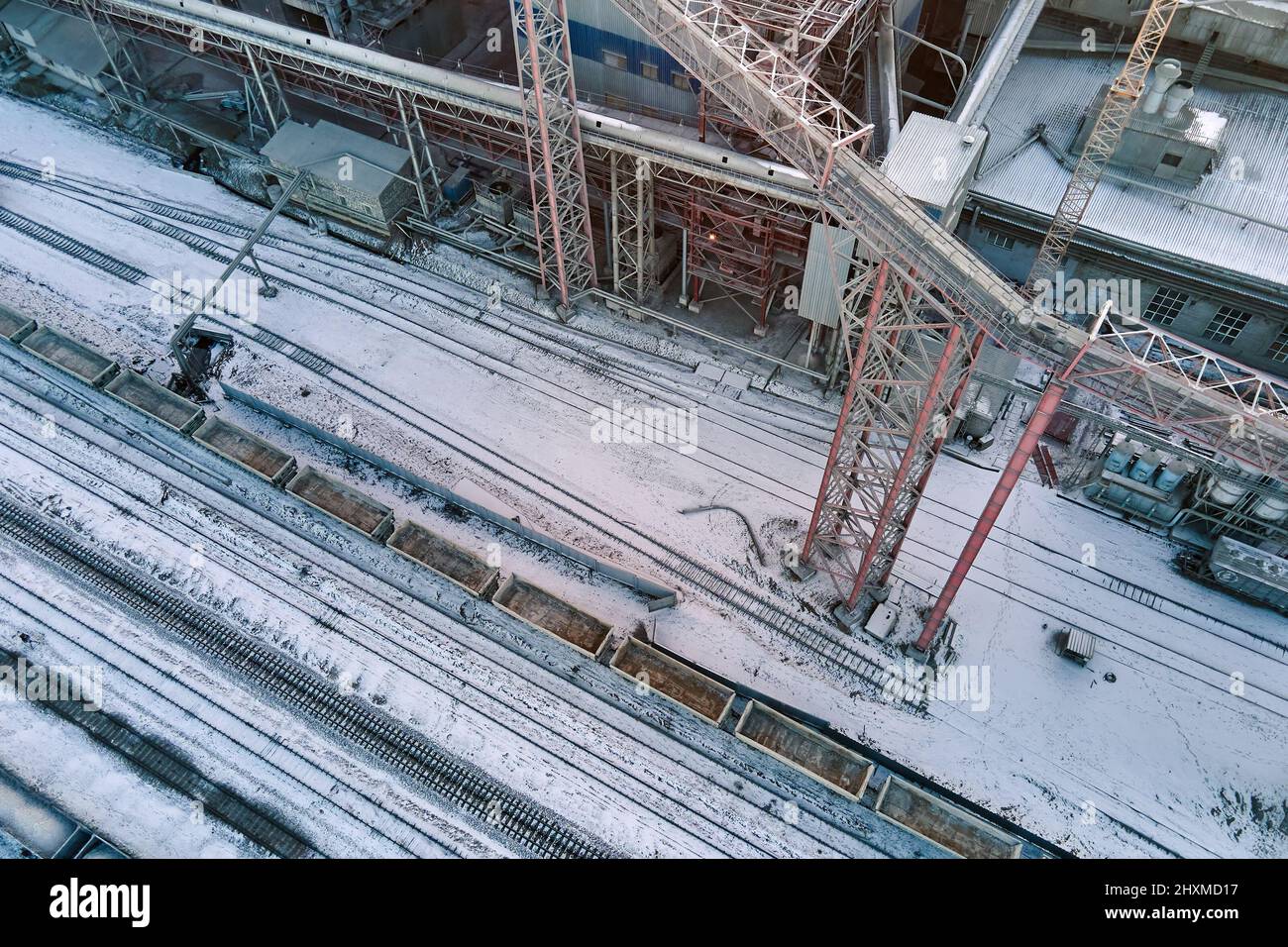 Aerial view of cargo train cars loaded with construction goods at ...
