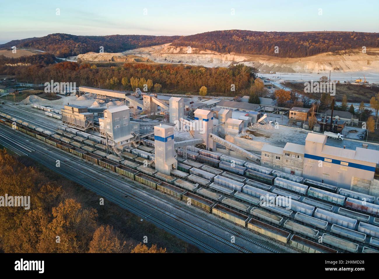 Aerial view of cargo train loaded with crushed sandstone materials at ...