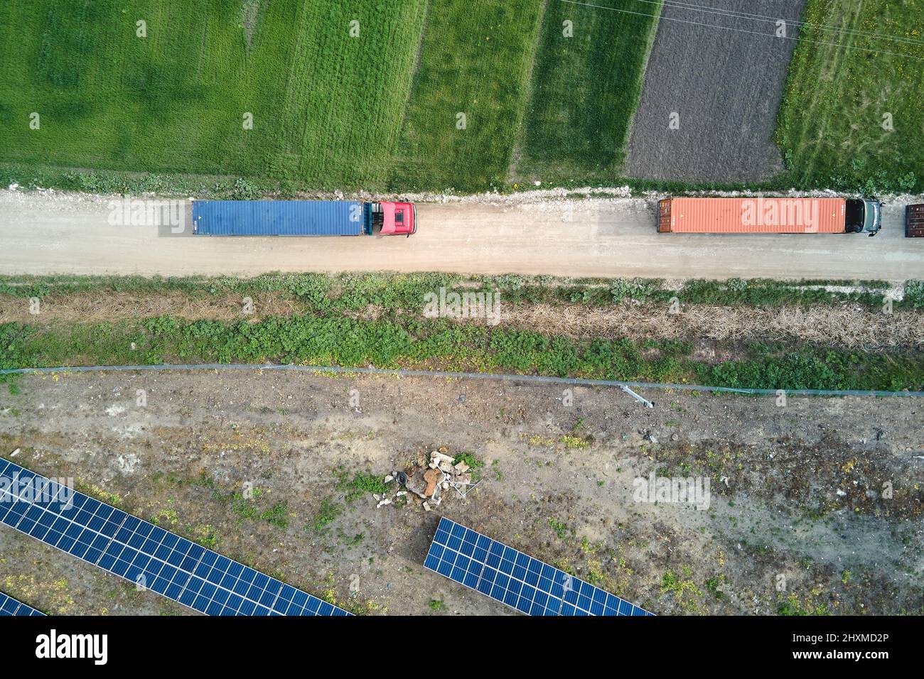 Aerial view of electrical power plant under construction with truck ...