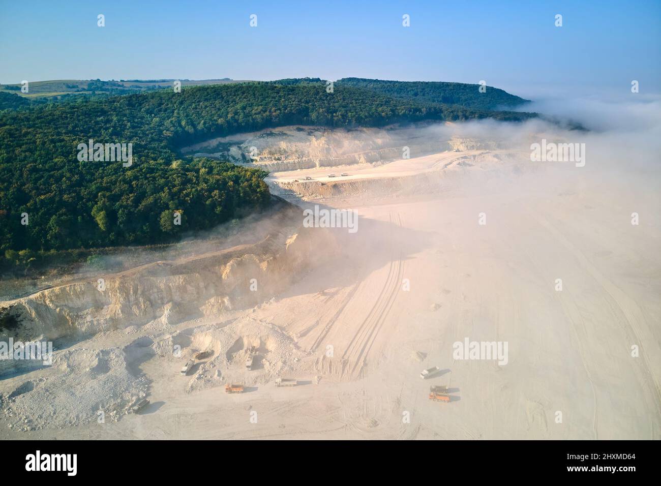 Aerial view of open pit mining of limestone materials for construction ...