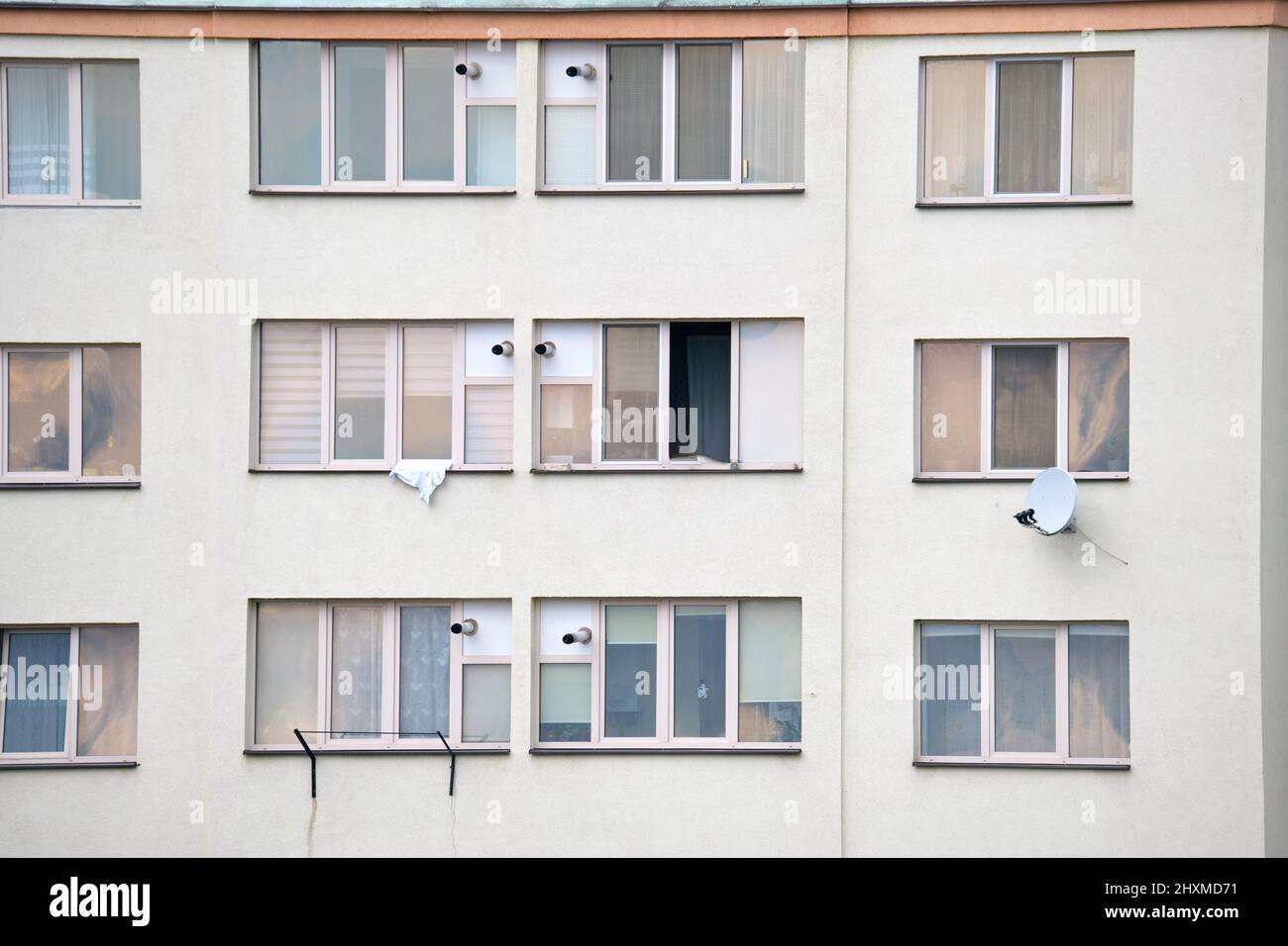 Architectural details of modern high apartment building facade with ...
