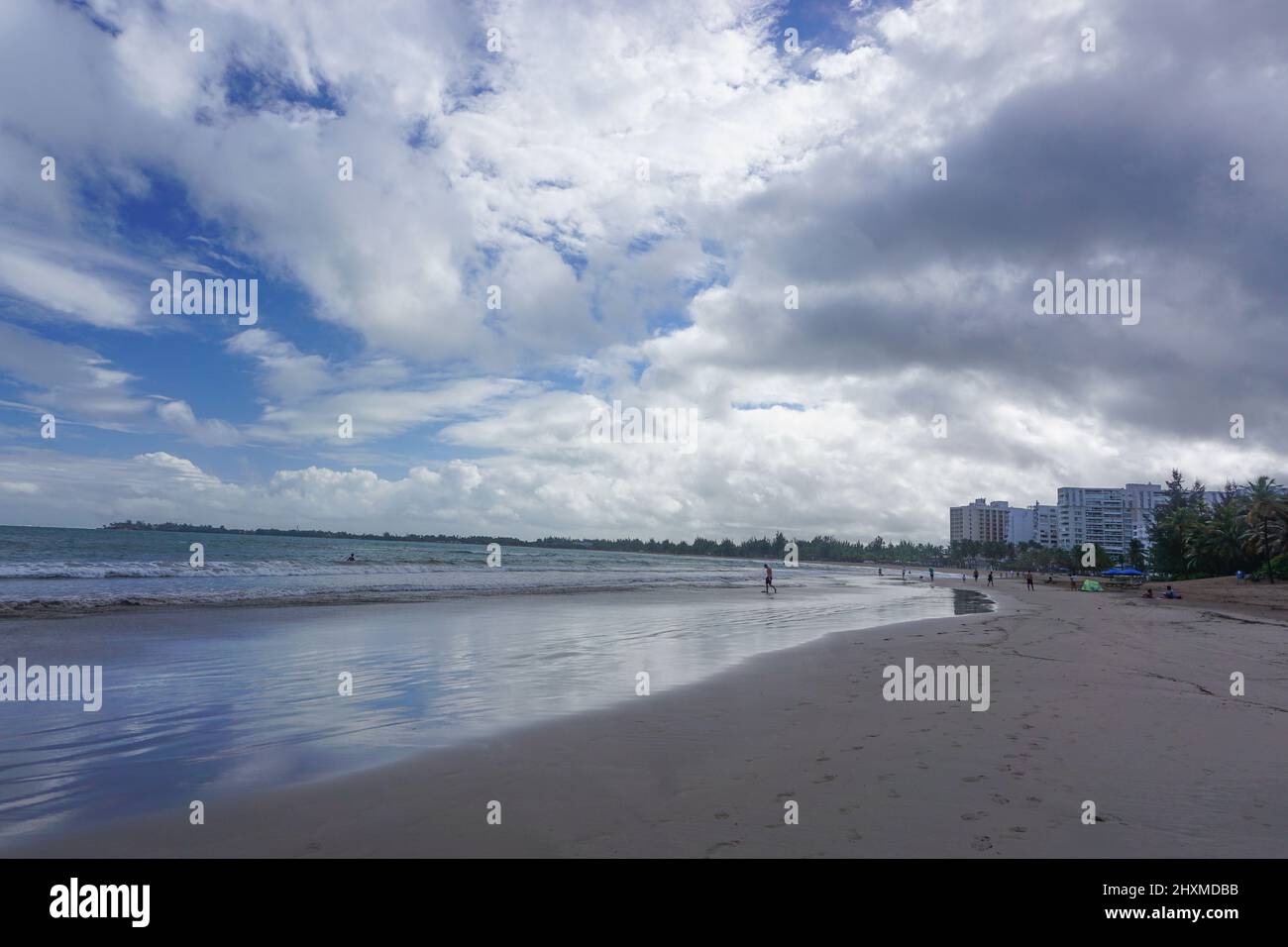 Isla Verde Beach, Puerto Rico, USA: Palm trees and hotels on a beach in ...
