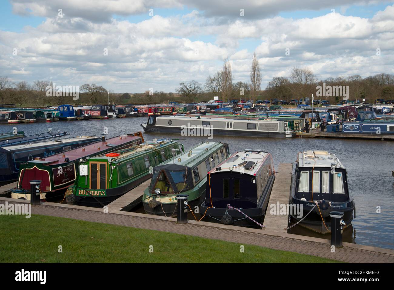 Privately-owned narrow boats moored in a marina on the Middlewich ...