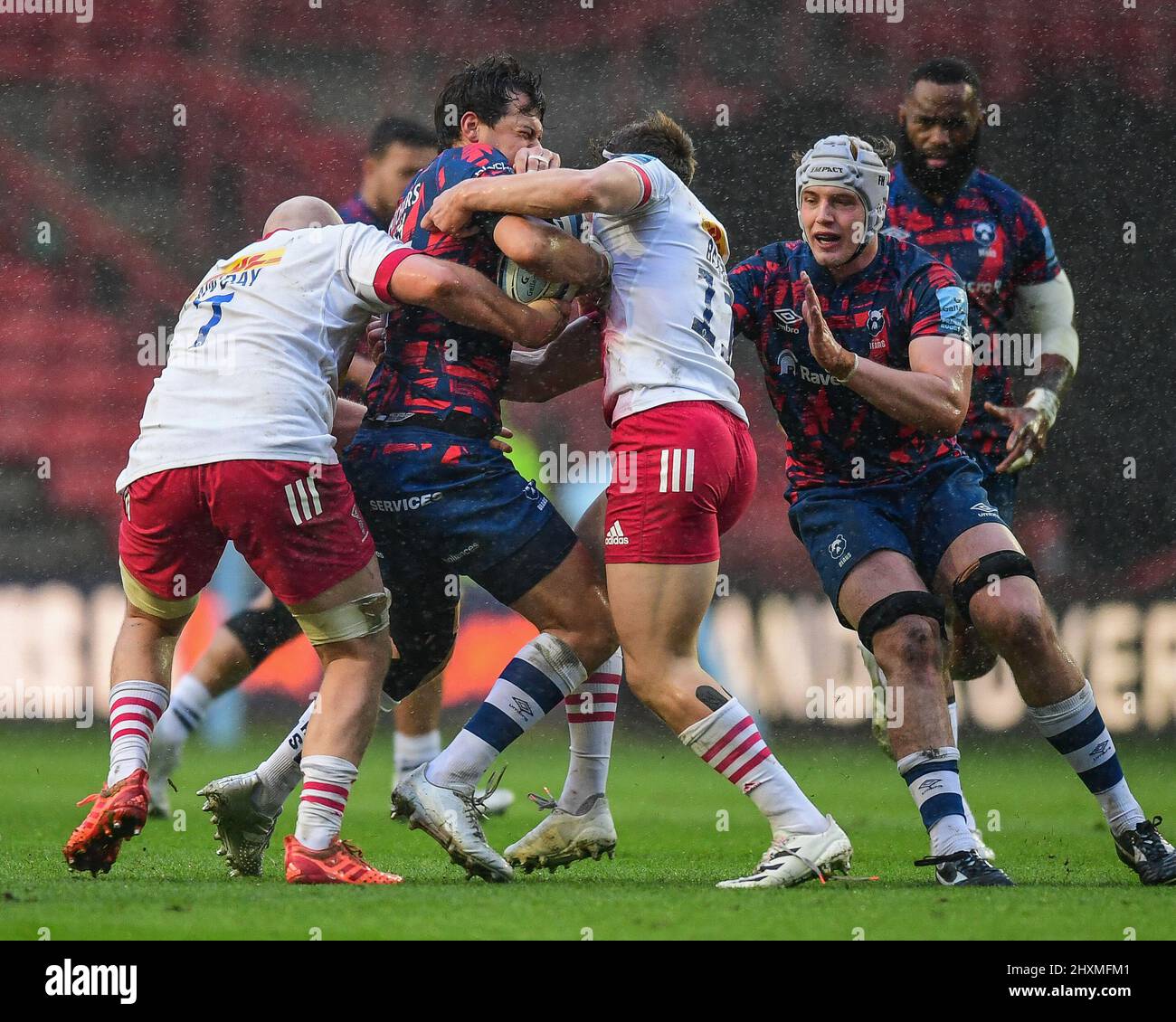 Antoine Frisch of Rugby Bristol Bears, tackled by Tom Lawday of ...