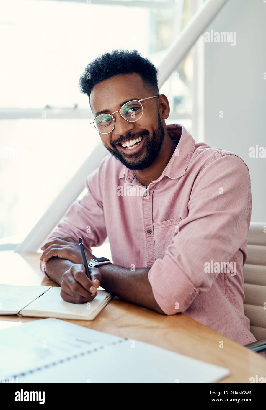 Note-taking is so undervalued these days. Cropped portrait of a ...