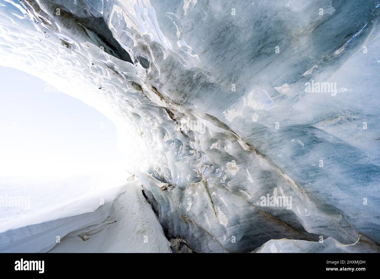 Breaking ice in glacier, ice wall texture taken from a natural glacier ...