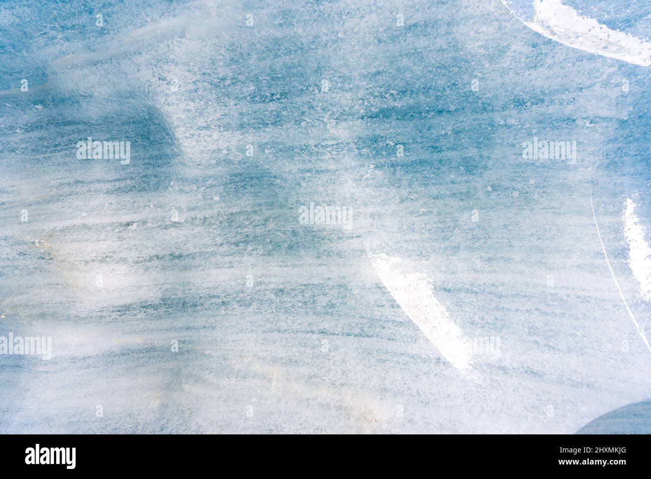 Breaking ice in glacier, ice wall texture taken from a natural glacier ...