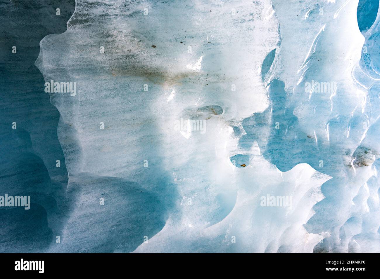 Breaking ice in glacier, ice wall texture taken from a natural glacier ...