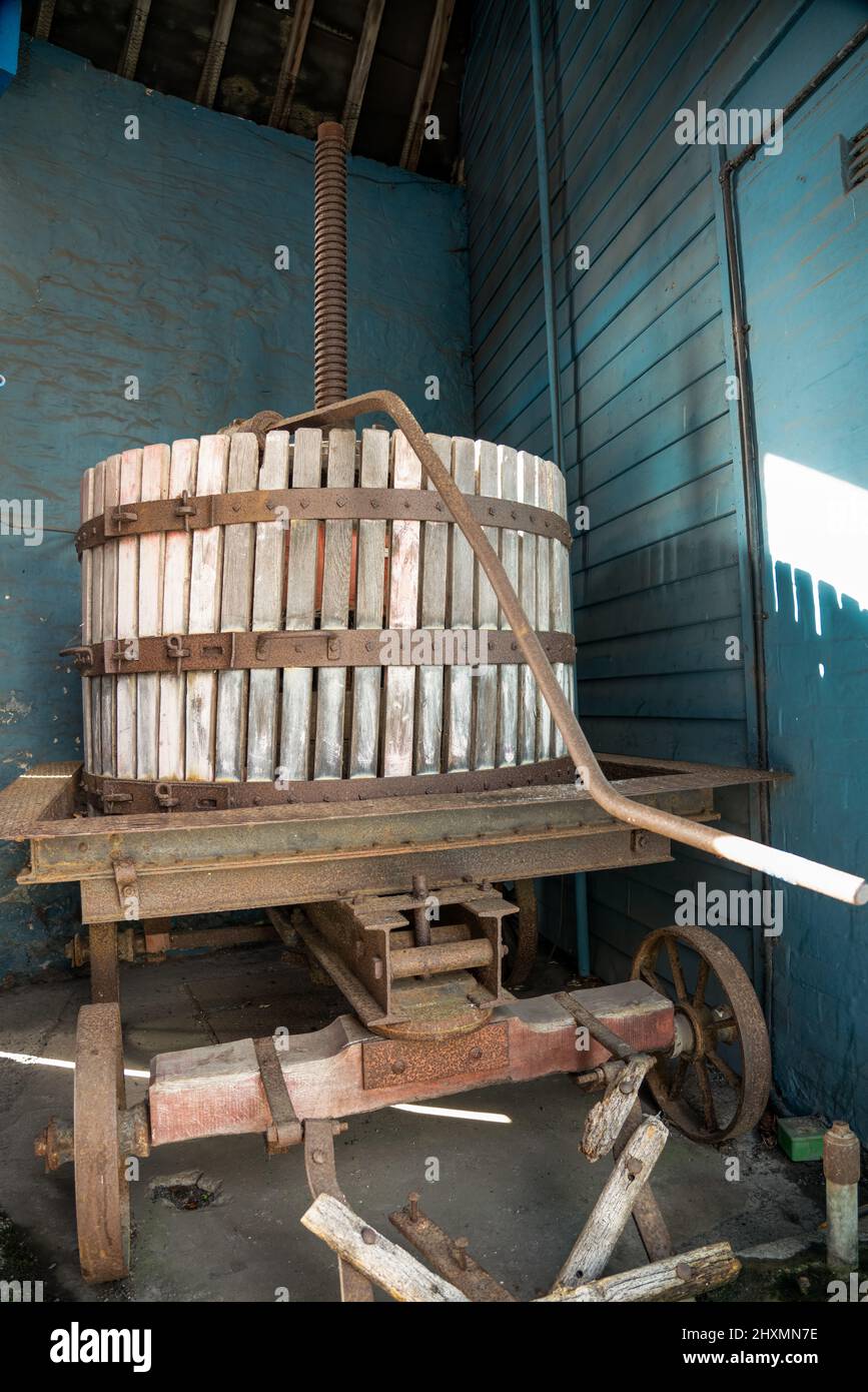 a vintage french grape press at a specialist wine merchants Stock Photo ...